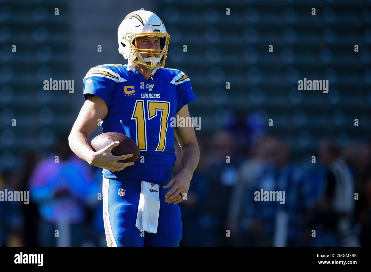 Los Angeles Chargers quarterback Phillip Rivers warms up before an NFL ...
