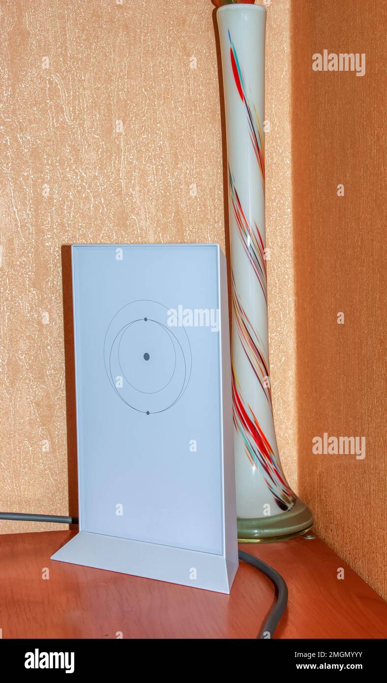 Terminal located in an apartment from a Starlink satellite dish, an ...