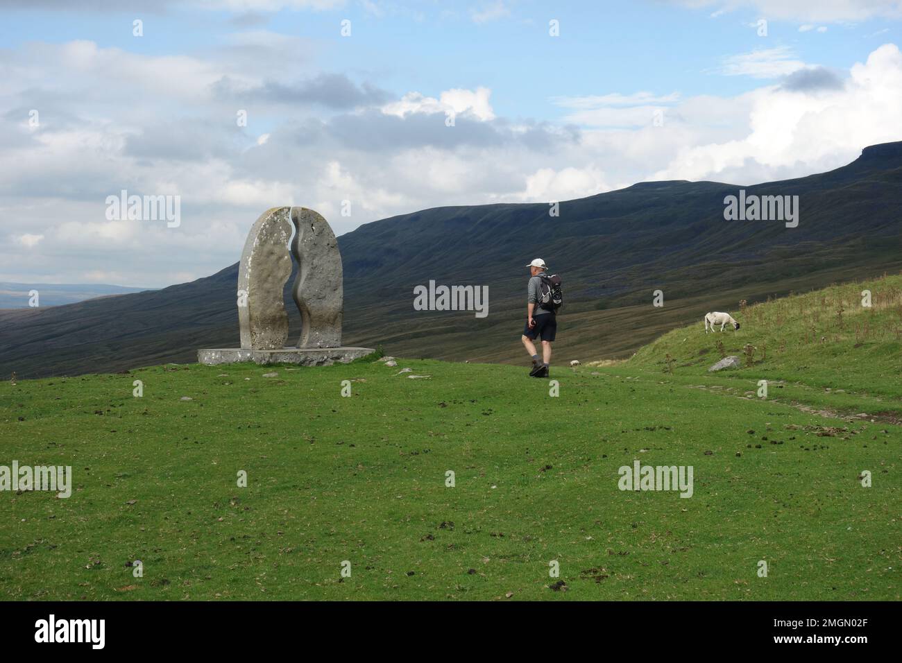 Man Walking to the Limestone 'Water Cut' Sculpture by Mary Bourne on ...