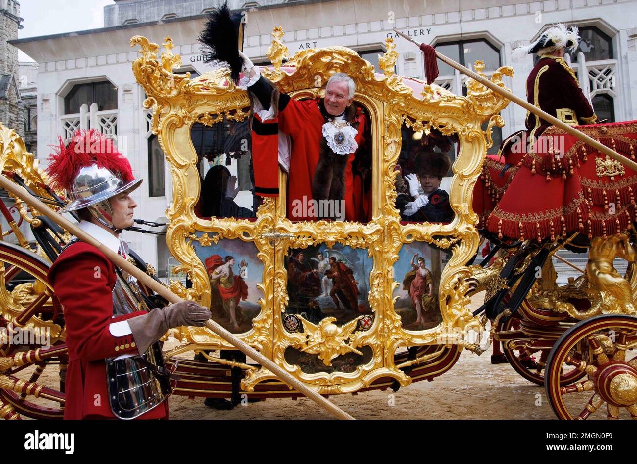 Lord Mayor, Nicholas Lyons, head of the City of London, waves from the ...