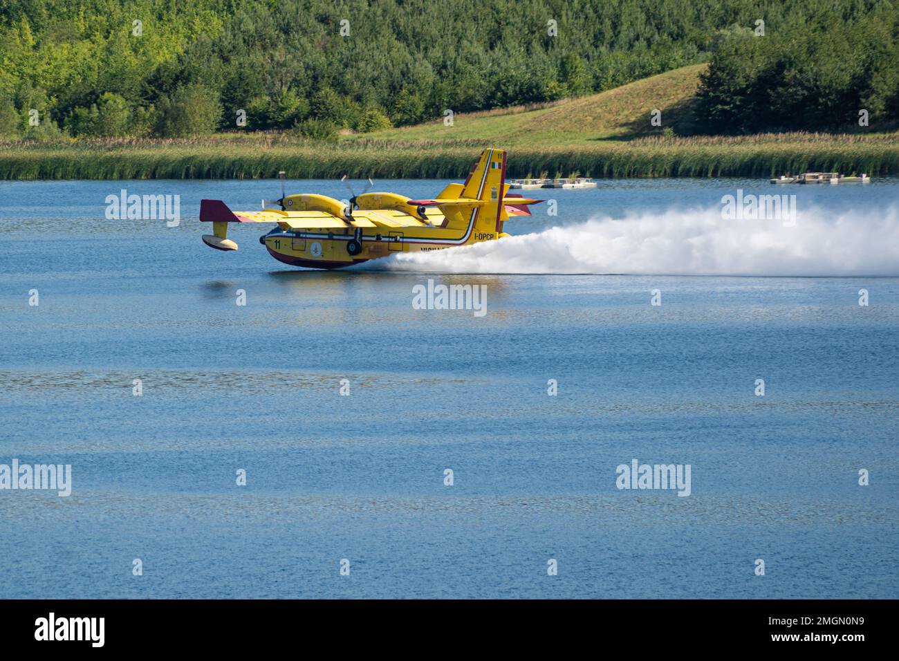 Lake Milada near Ústí nad Labem, a firefighting plane prepares to ...