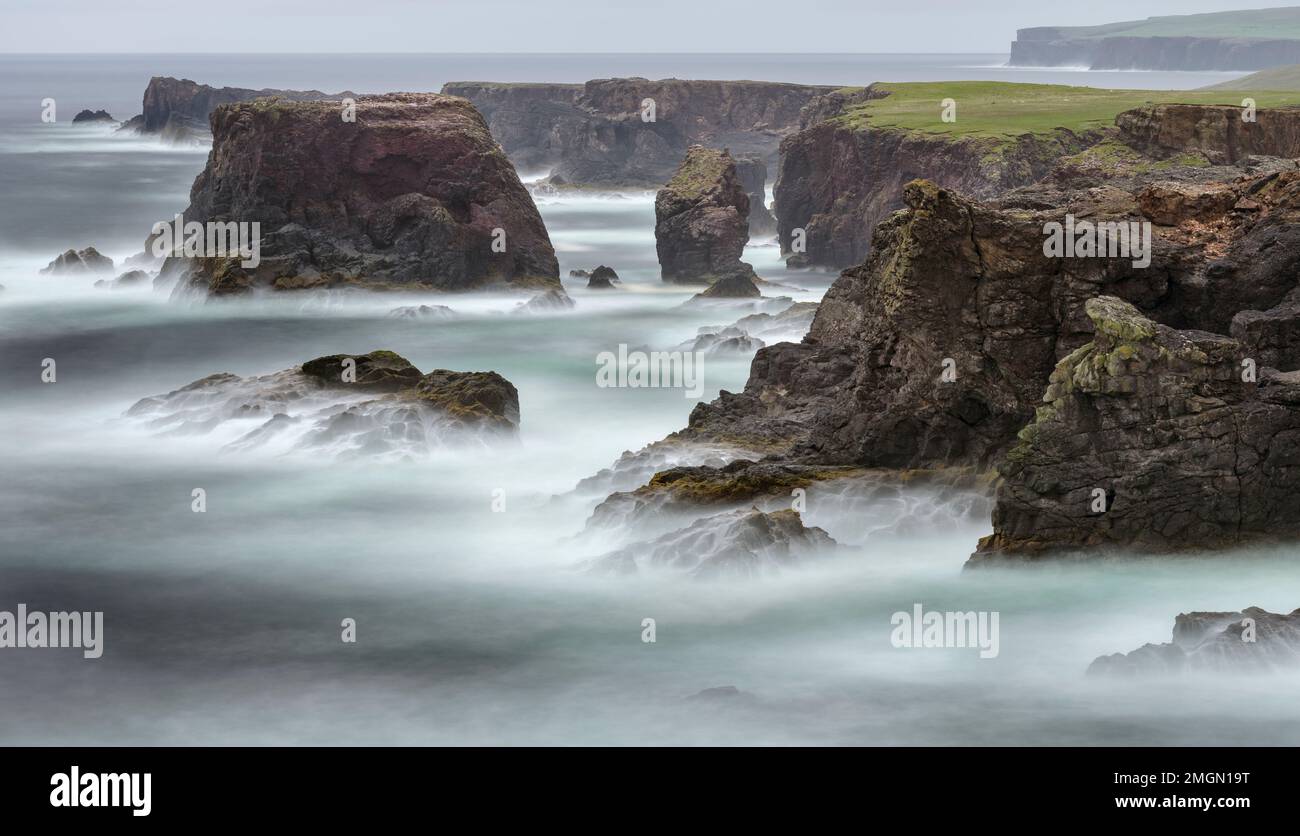 Landscape on the Eshaness peninsula. The famous cliffs and sea stacks ...