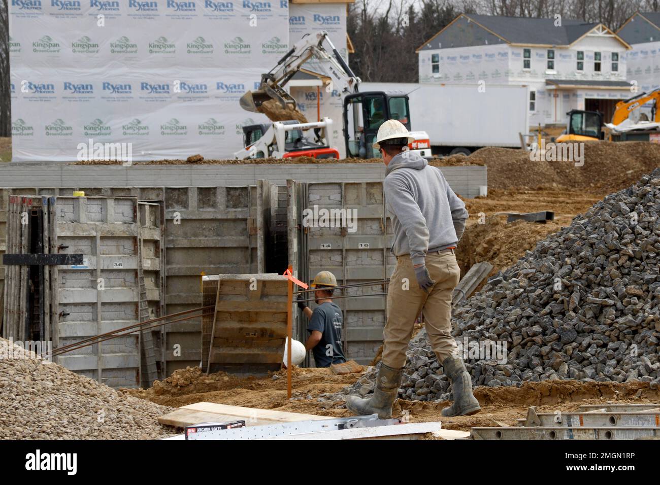 Construction continues at a housing plan in Zelienople, Pa., Wednesday ...