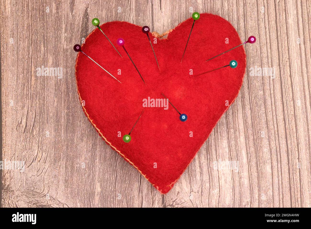 red corduroy heart with pins pincushion valentine heartbreak Stock ...