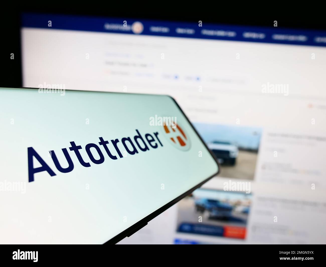 Smartphone with logo of American car marketplace company Autotrader.com ...