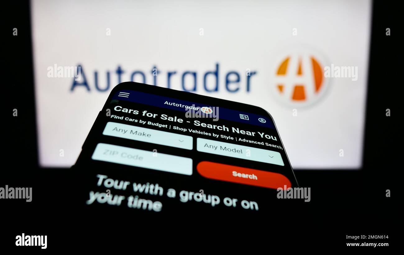 Mobile phone with website of US car marketplace company Autotrader.com ...