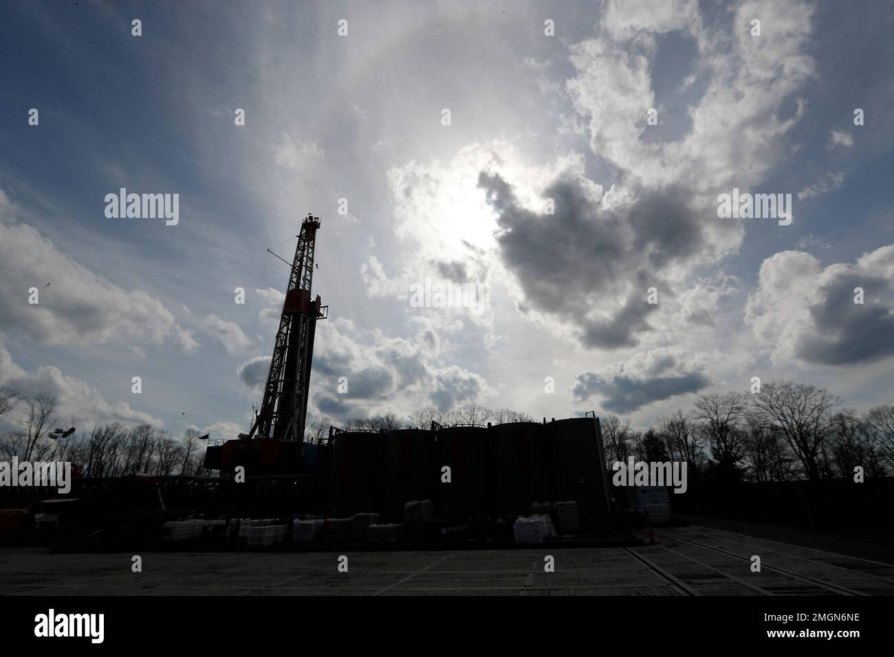 In this photo made on Thursday, March 12, 2020, the sun shines through ...