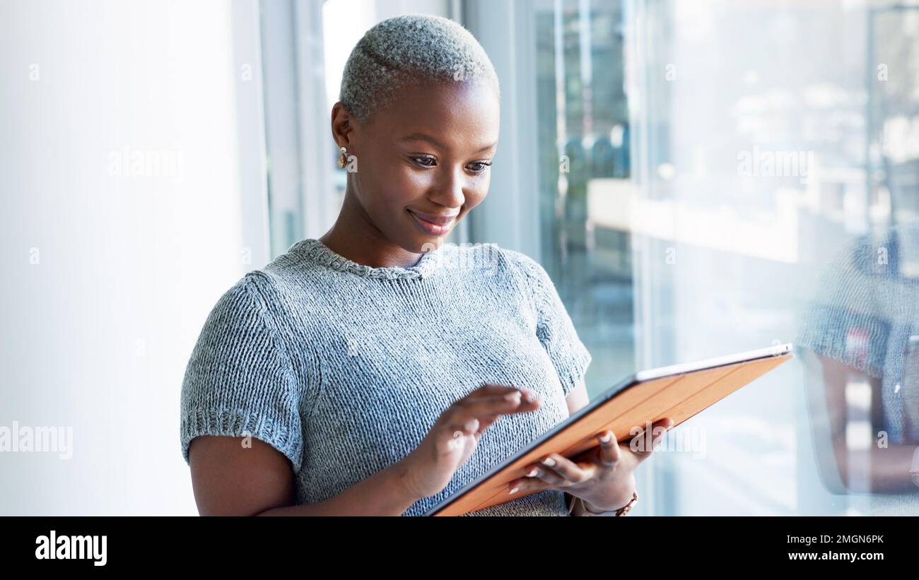 Satisfied black woman reading email hi-res stock photography and images ...