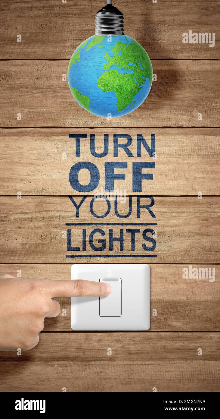 Human hand turning off the switch. Earth Hour Concept Stock Photo - Alamy