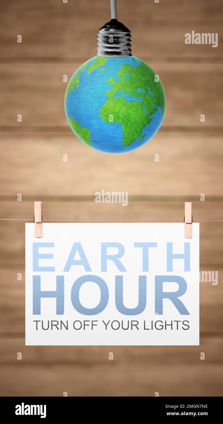 Electricity cable with earth lamp. Earth Hour Concept Stock Photo - Alamy