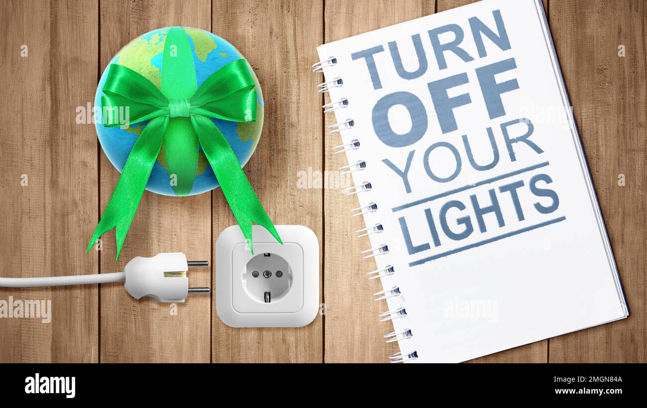 Electricity cable and plug connect. Earth Hour Concept Stock Photo - Alamy