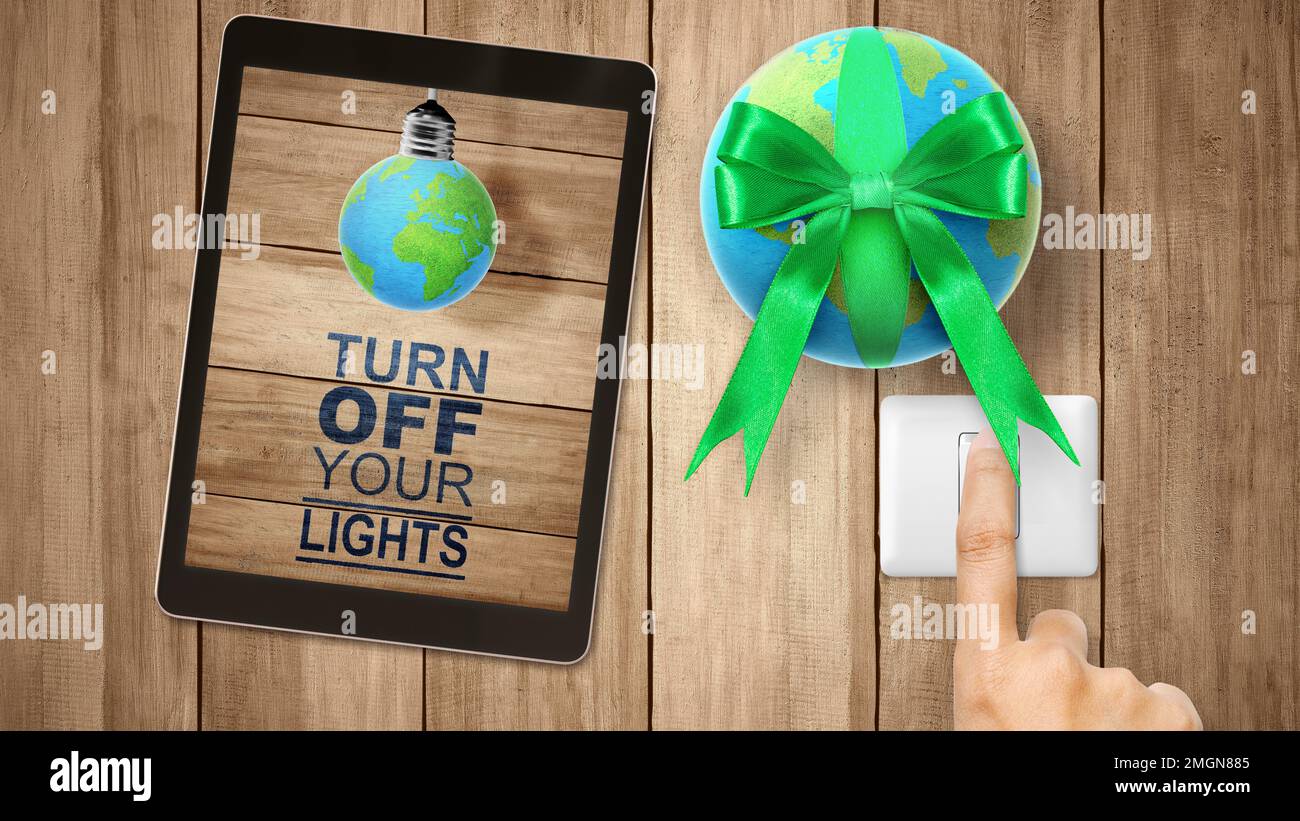 Human hand turning off the switch. Earth Hour Concept Stock Photo - Alamy