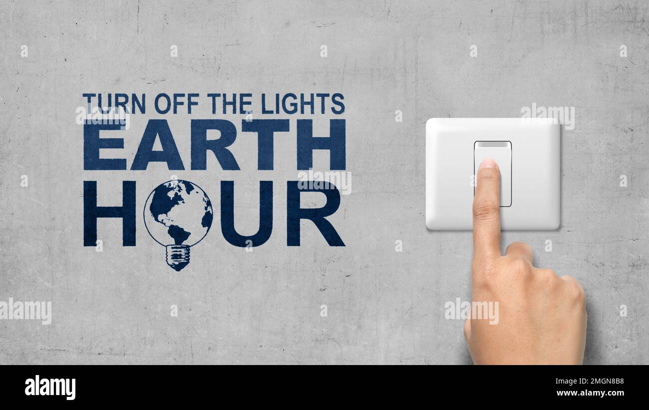Human hand turning off the switch. Earth Hour Concept Stock Photo - Alamy