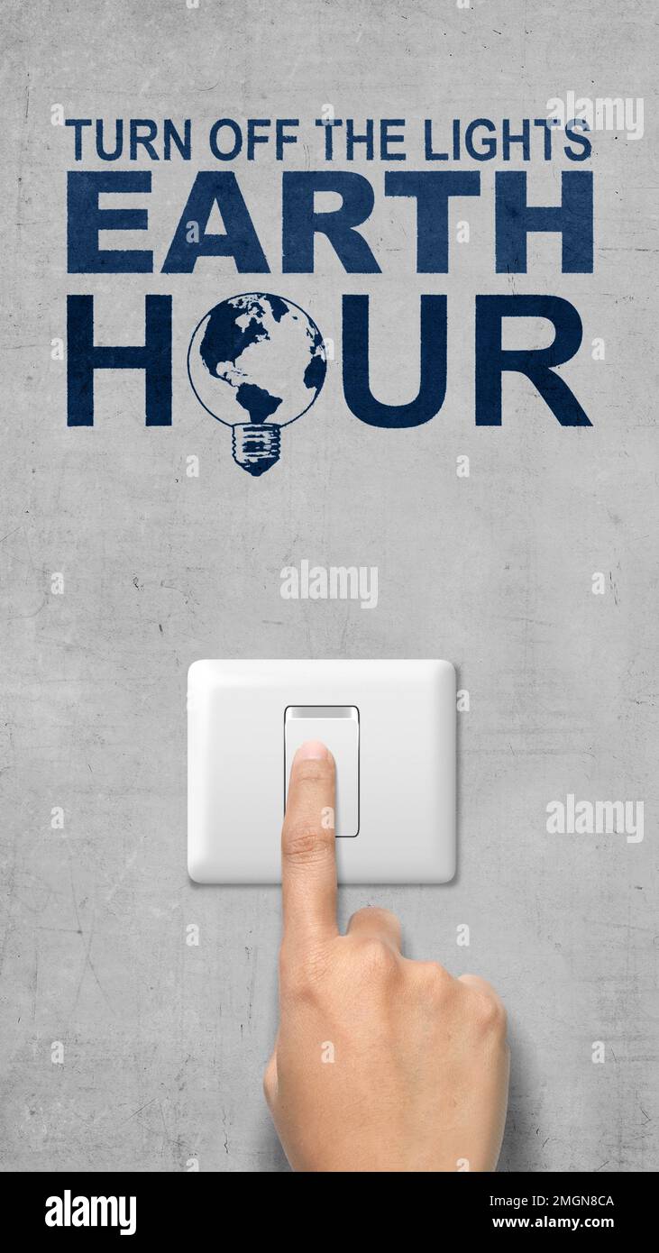 Human hand turning off the switch. Earth Hour Concept Stock Photo - Alamy