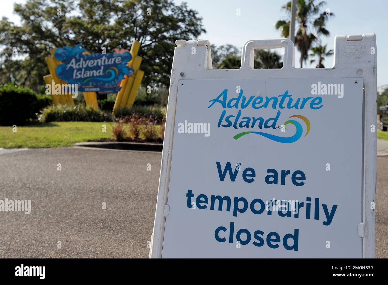 A sign outside the Adventure Island water theme park is shown Monday ...
