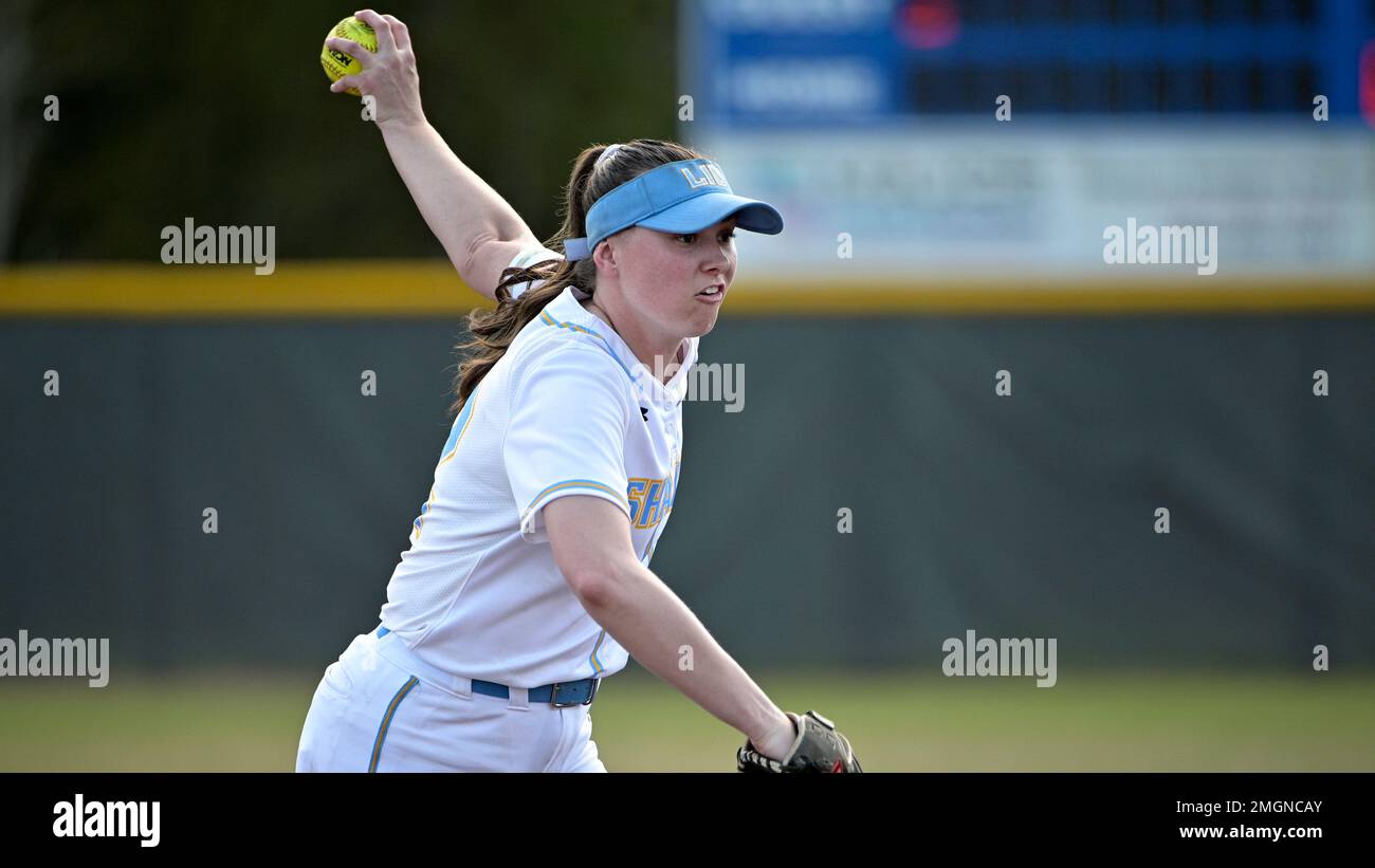 Long Island pitcher Tallie Woodson (12) throws to home plate during an ...