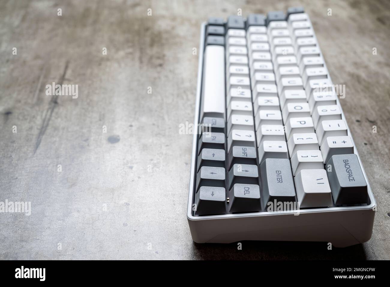 The mechanical keyboard on textured background Stock Photo - Alamy