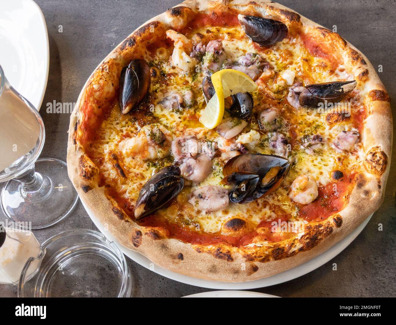 Pepperoni and squid pizza hi-res stock photography and images - Alamy