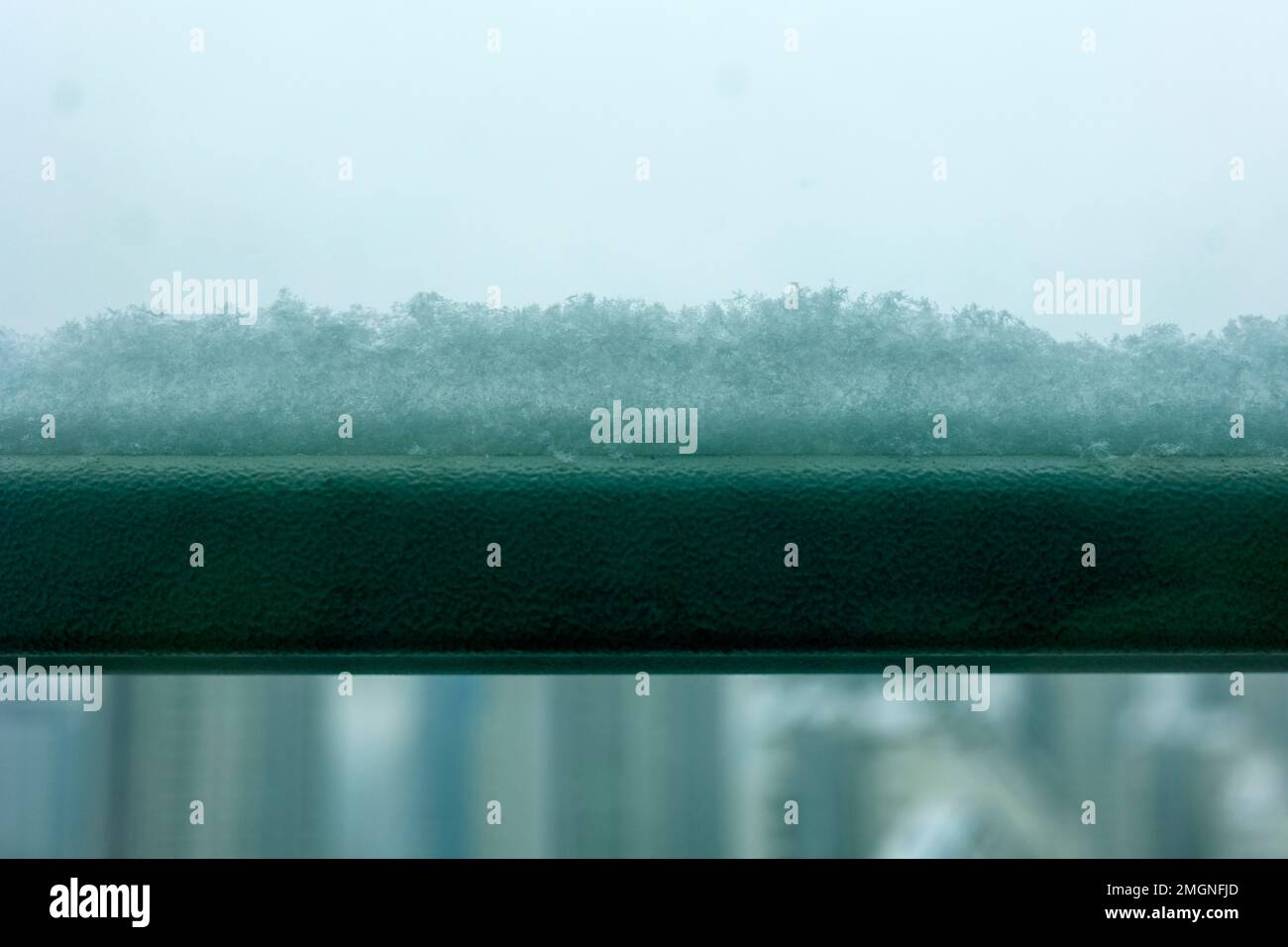 The thick snow on the fence of terrace Stock Photo - Alamy