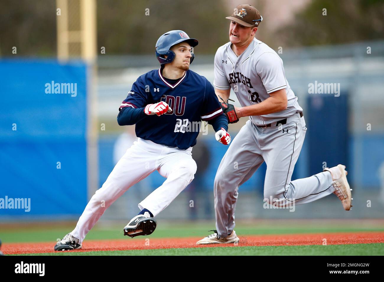 Lehigh's Casey Rother (23) tags out Fairleigh Dickinson's Mike Veit (22 ...