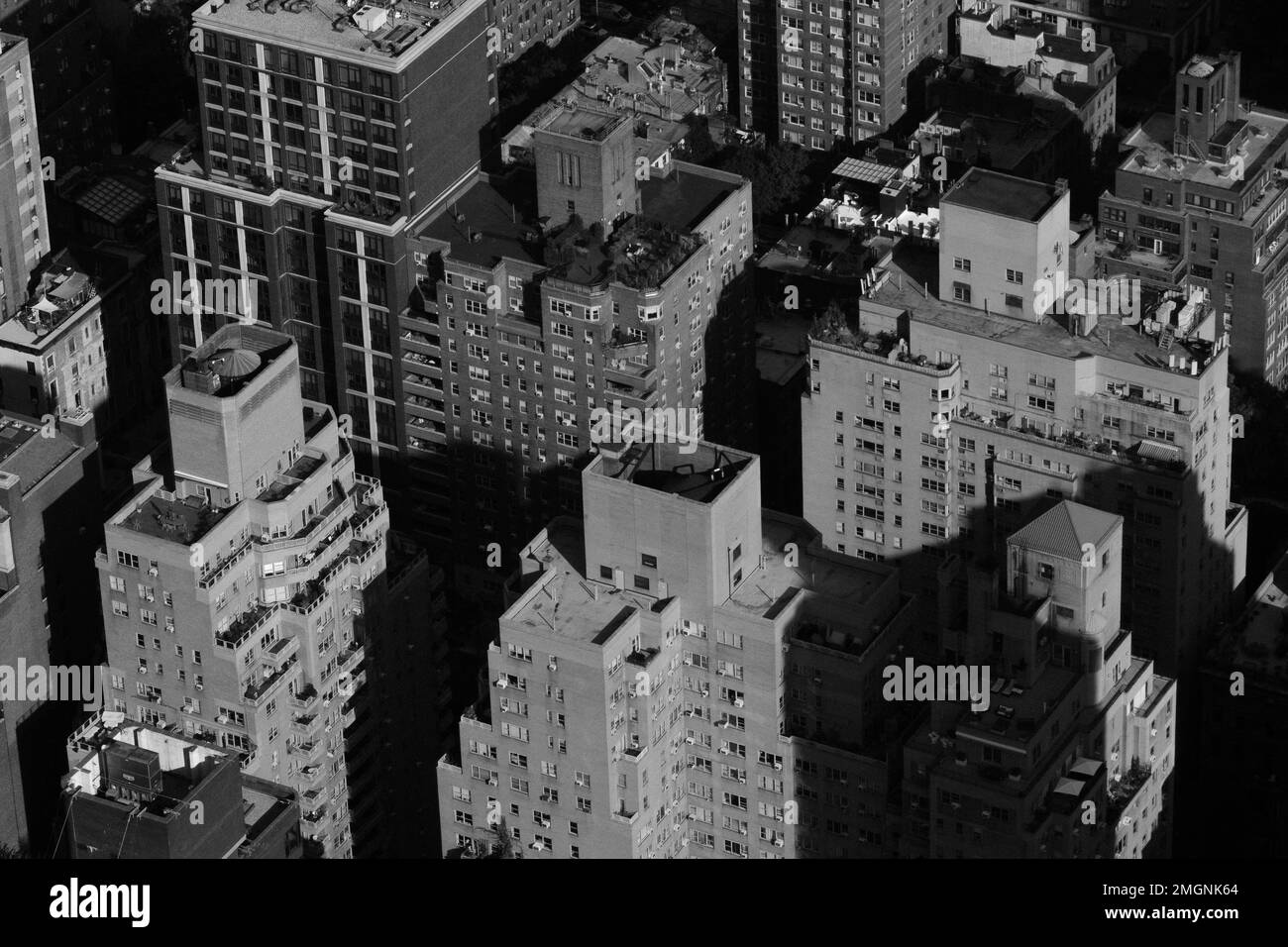 An aerial grayscale of the tall buildings and skyscrapers during the ...