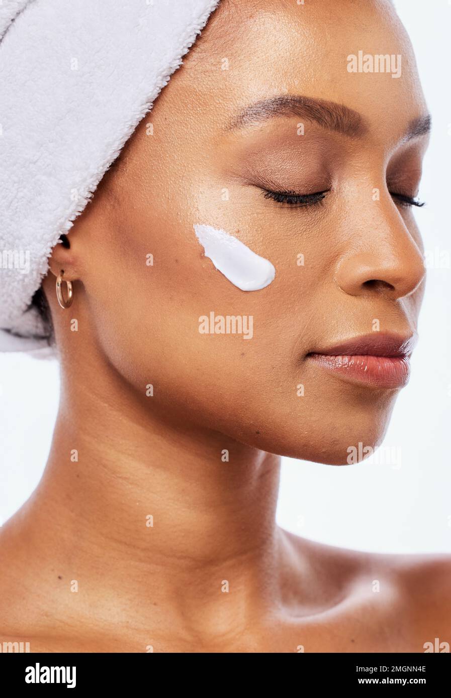 Skin care, beauty cream and face of a woman in studio for dermatology ...