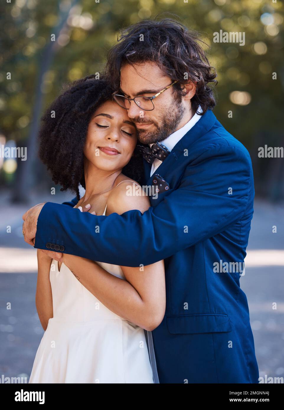 Interracial wedding, black woman and man with hug with smile, happiness ...