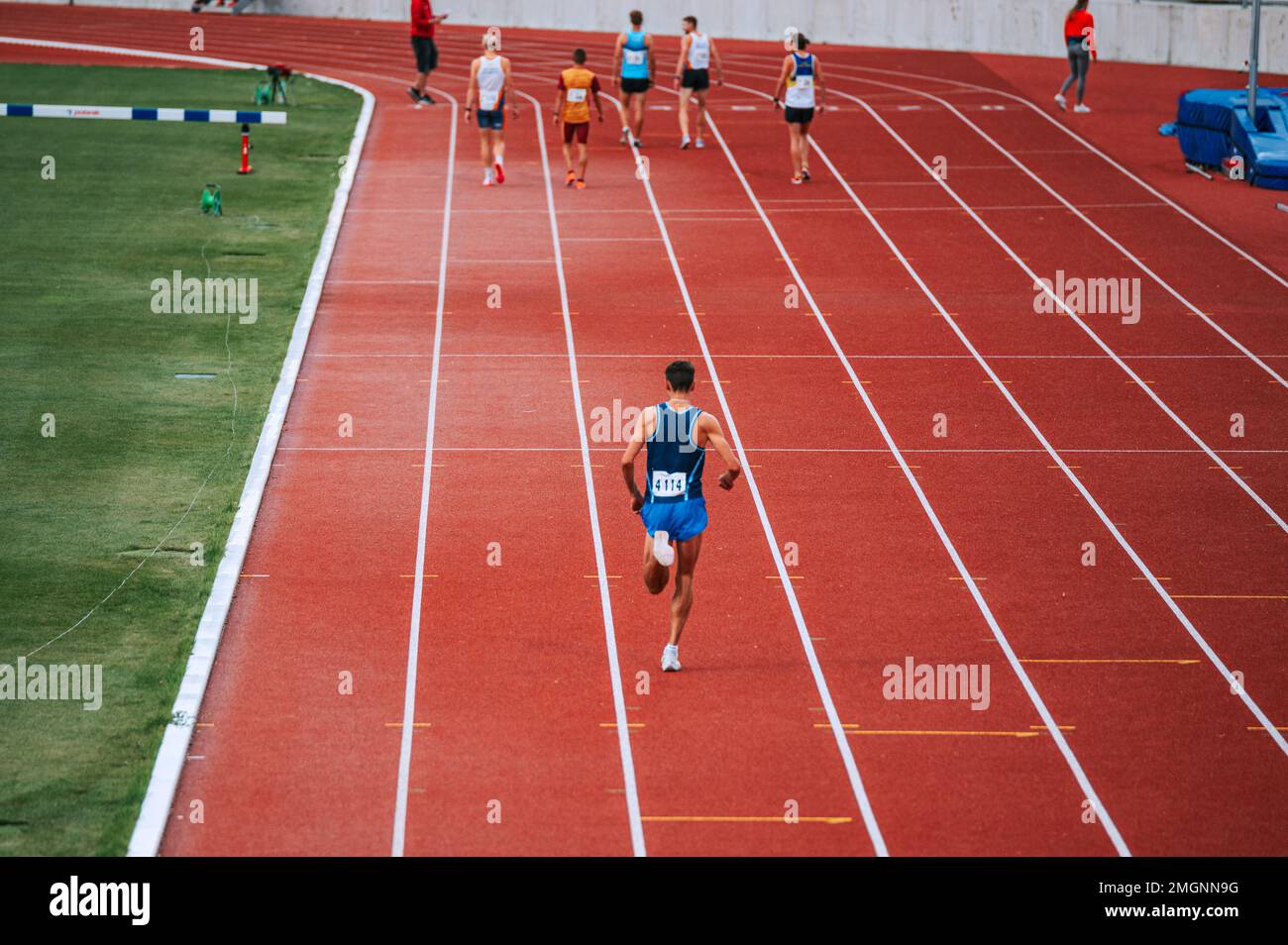 Image Of Long Distance Runners At The Starting Line Of A 5000m Race