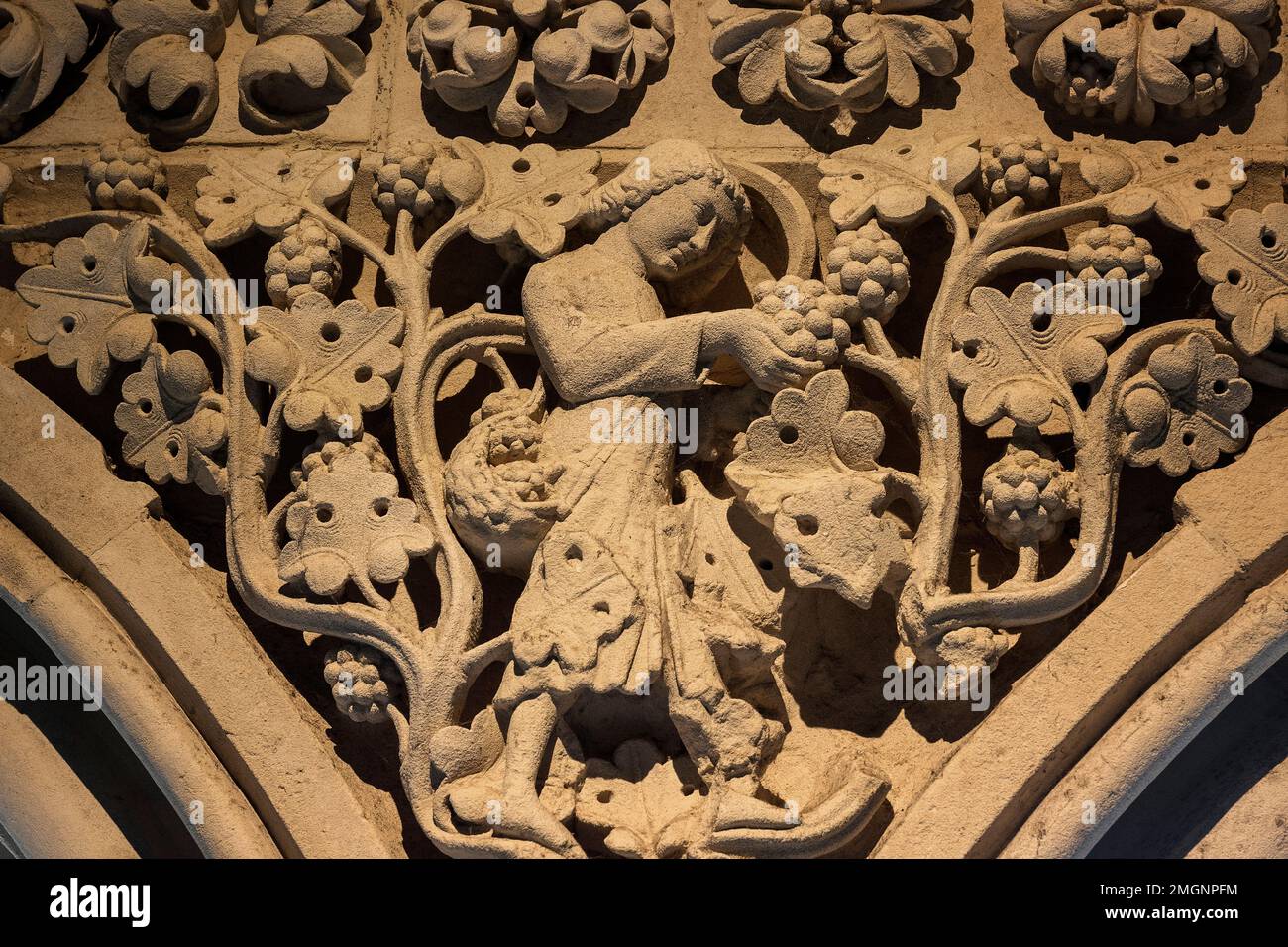 Sculptures in Caen stone: a winemaker, cloister of Mont Saint Michel ...