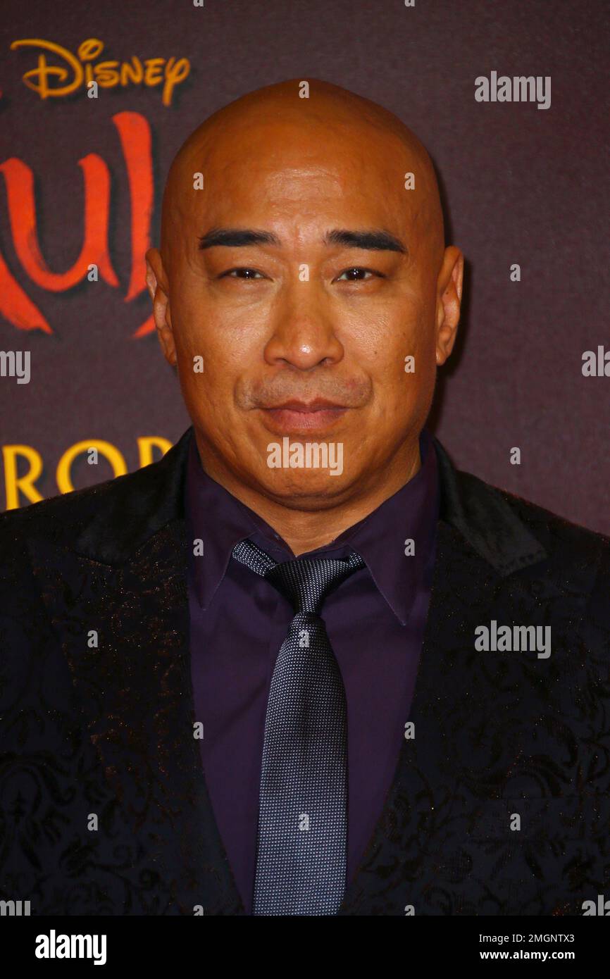 Actor Ron Yuan poses for photographers upon arrival at the European ...