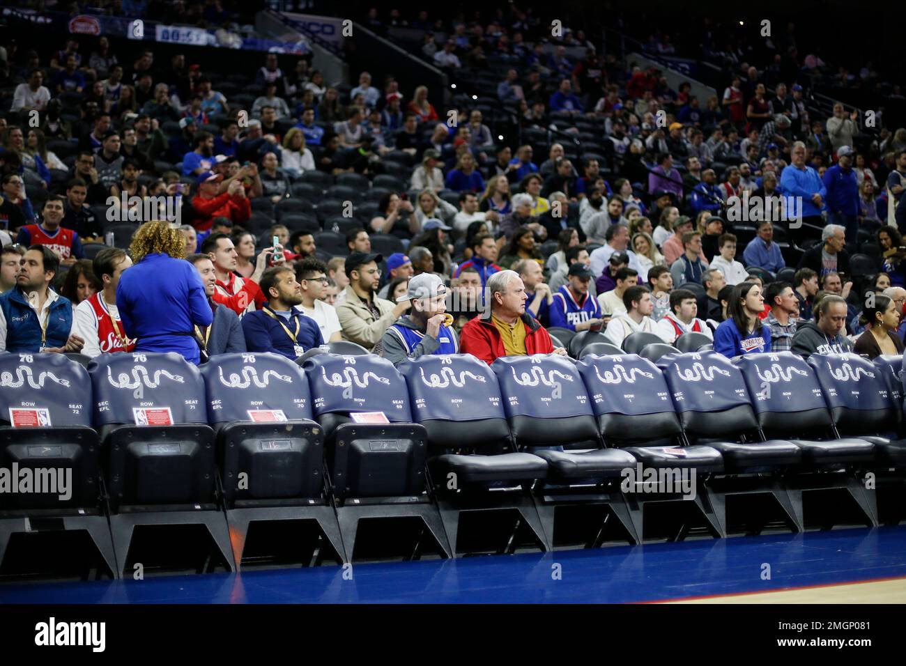 Empty seats are seen during the first half of an NBA basketball game ...