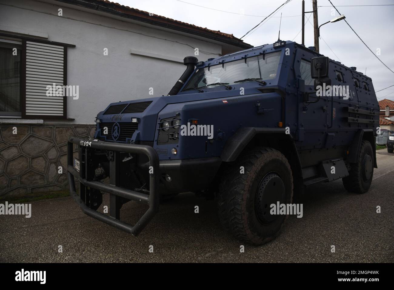 An Austrian police special forces armoured vehicle drives near the ...