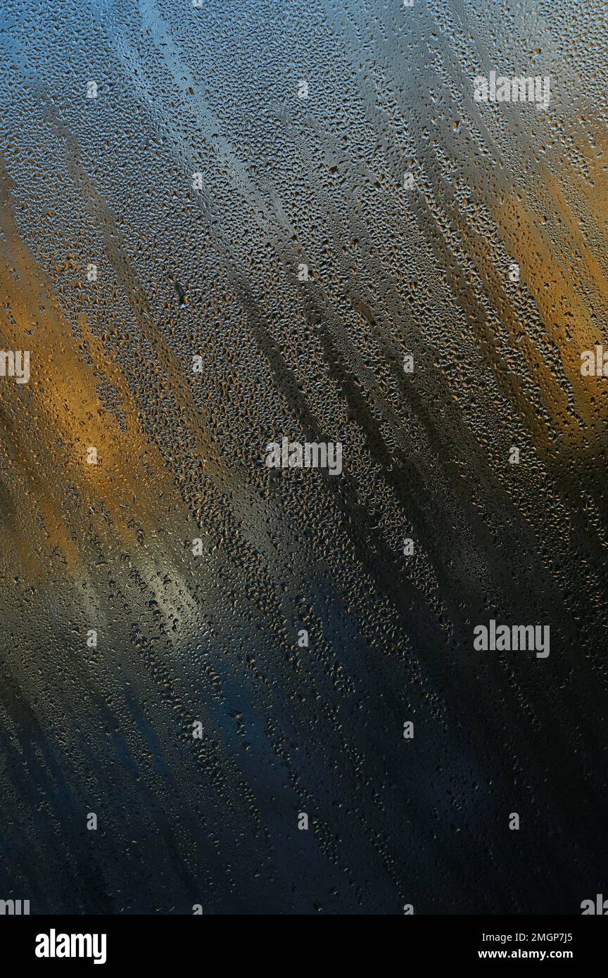 glass with drops of water or dew. vertical Stock Photo - Alamy