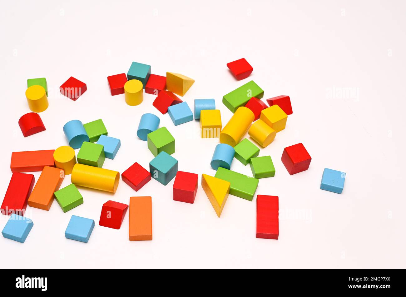 wooden figures of bricks cubes on a white background. Educational games ...