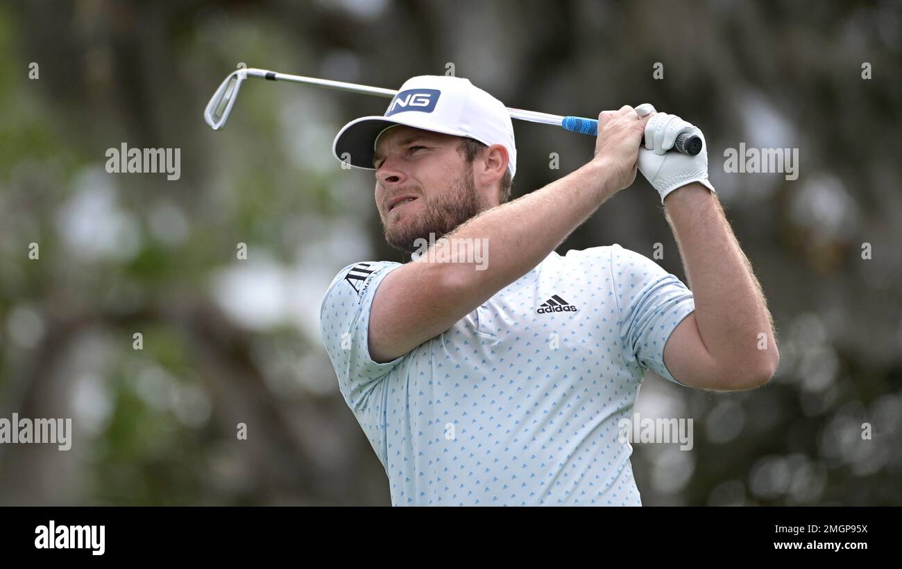 Tyrrell Hatton, of England, watches his tee shot on the second hole ...