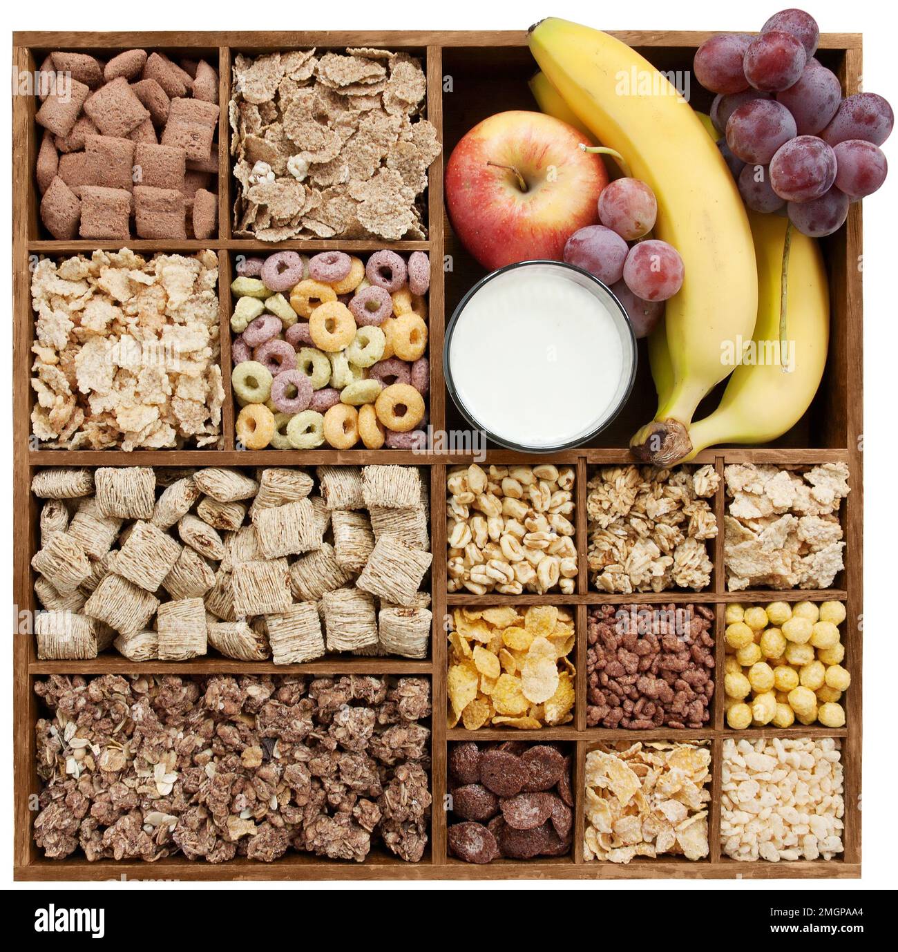 assorted cereals in wooden box with milk and fruits (manual focus Stock ...