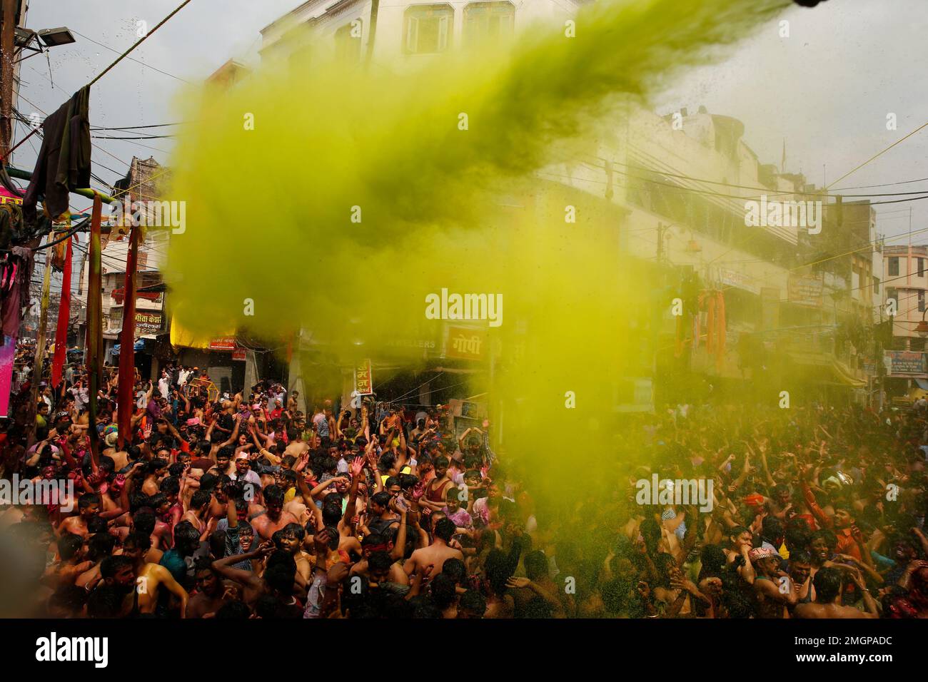 Indians spray color and dance during celebrations marking Holi, the ...