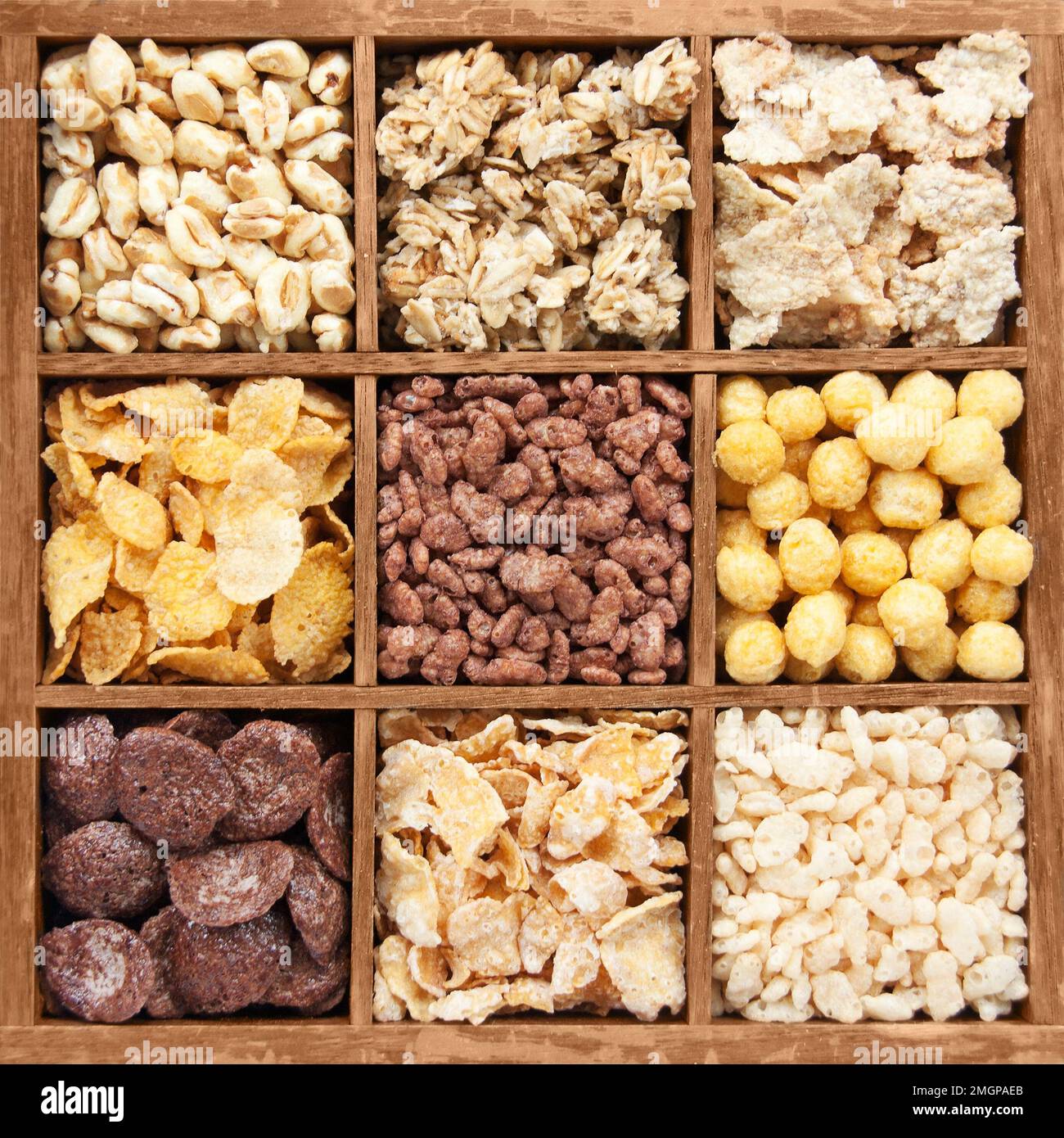 Assorted cereals in wooden box Stock Photo - Alamy
