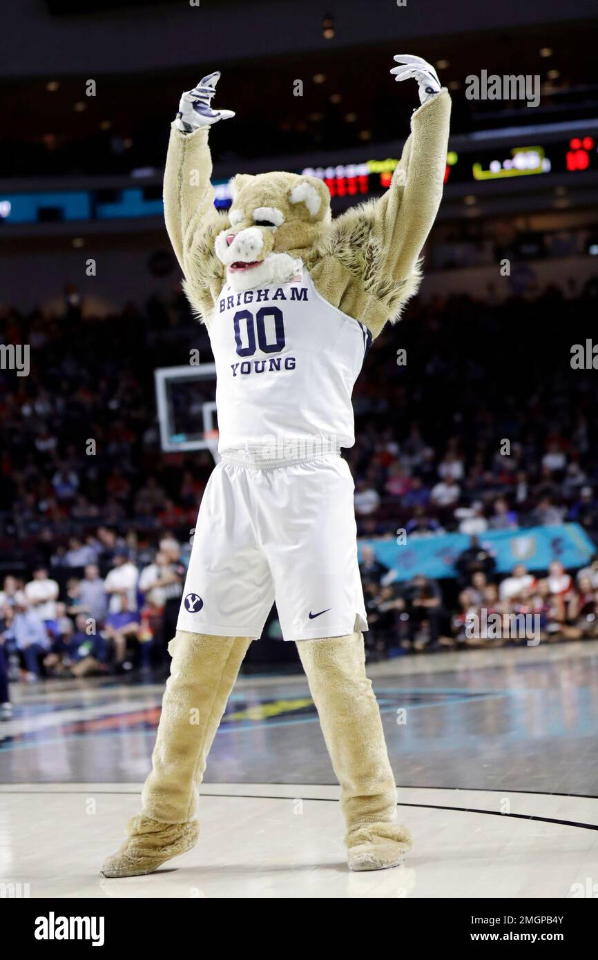 BYU mascot Cosmo the Cougar leads a cheer during the first half of an ...