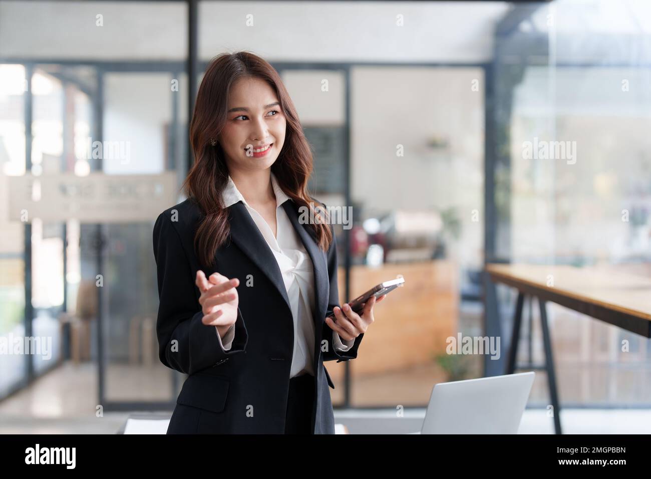 Beautiful Business woman working at home office and analyze financial ...