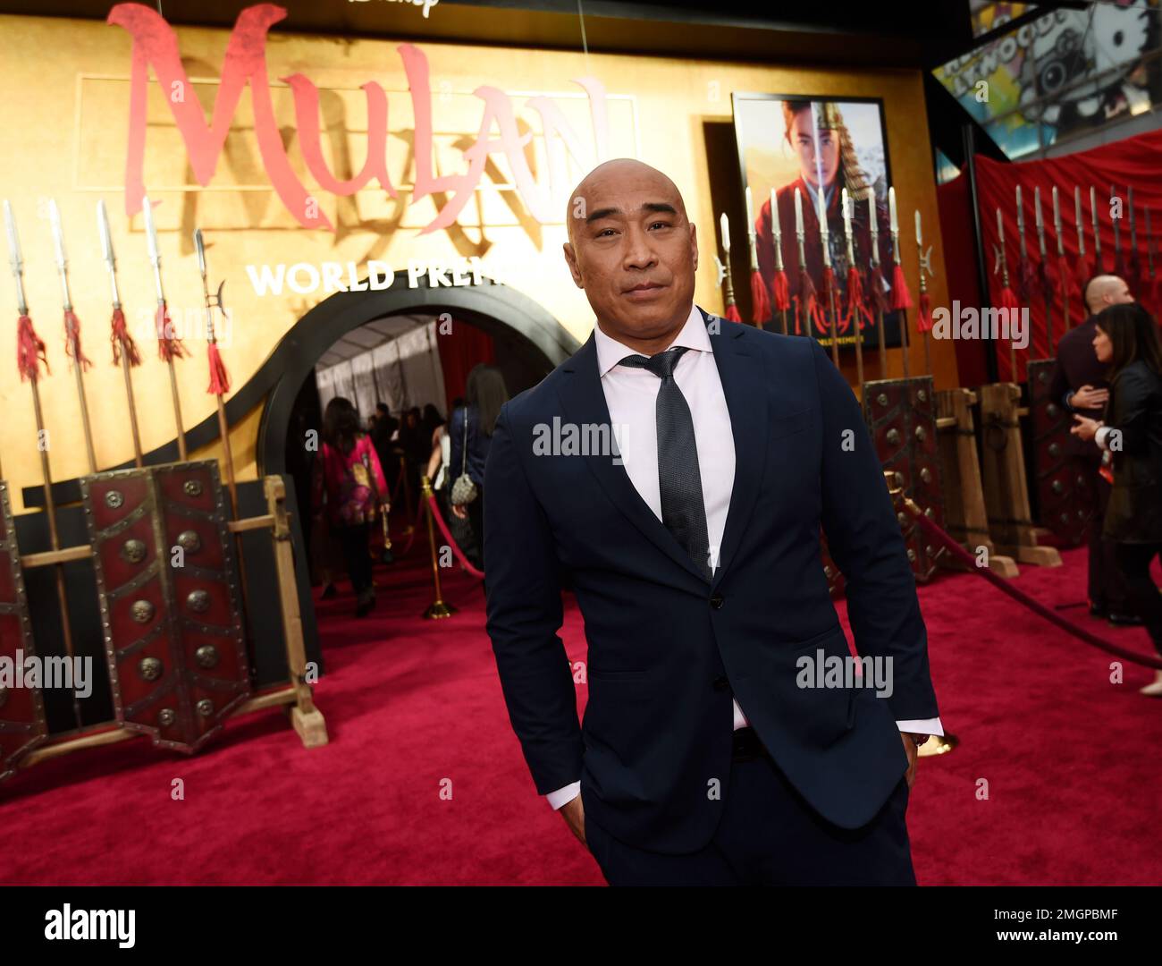 Ron Yuan, a cast member in "Mulan," poses at the premiere of the film ...
