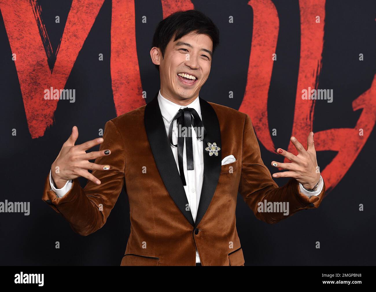 Cast member Jimmy Wong arrives at the Los Angeles premiere of "Mulan ...