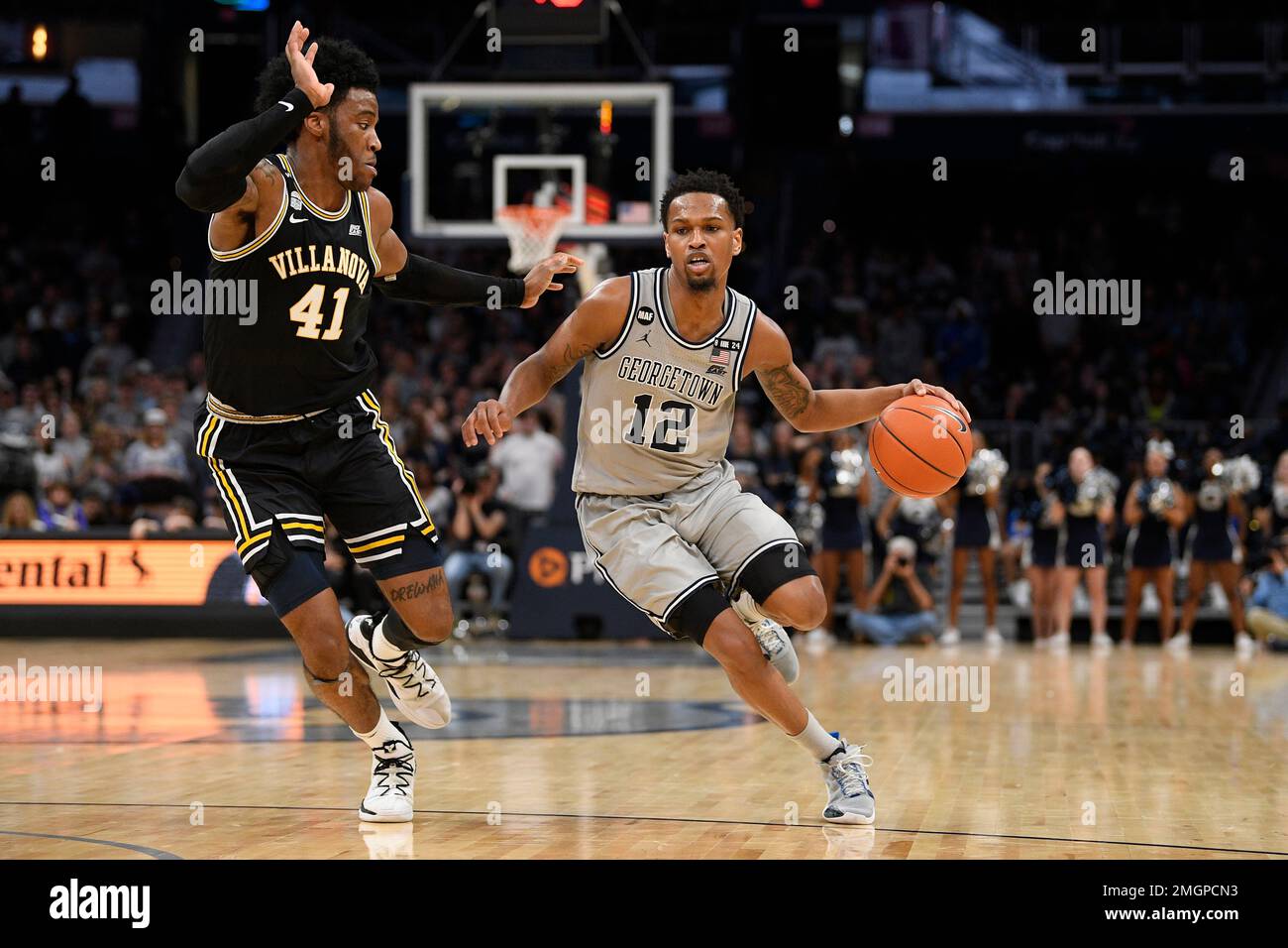 Georgetown guard Terrell Allen (12) dribbles the ball against Villanova ...