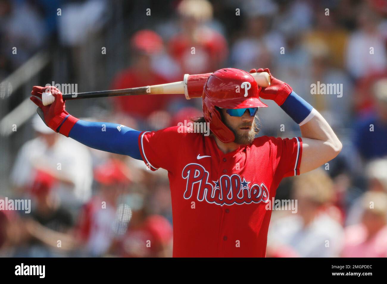 Philadelphia Phillies' Bryce Harper stretches during a spring training ...