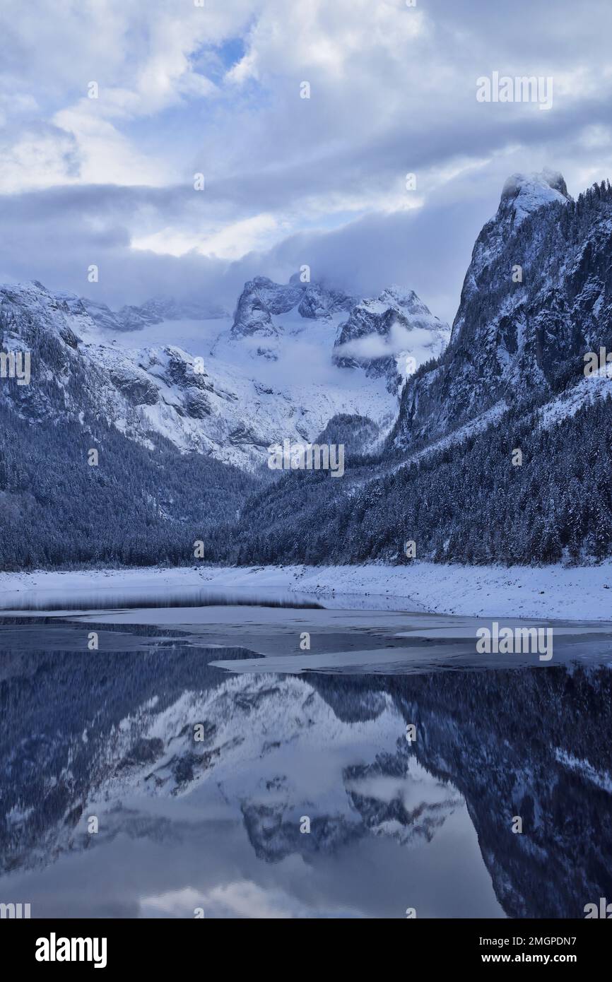 Scenic view of Vorderer Gosausee on a winter day, vertical Stock Photo ...