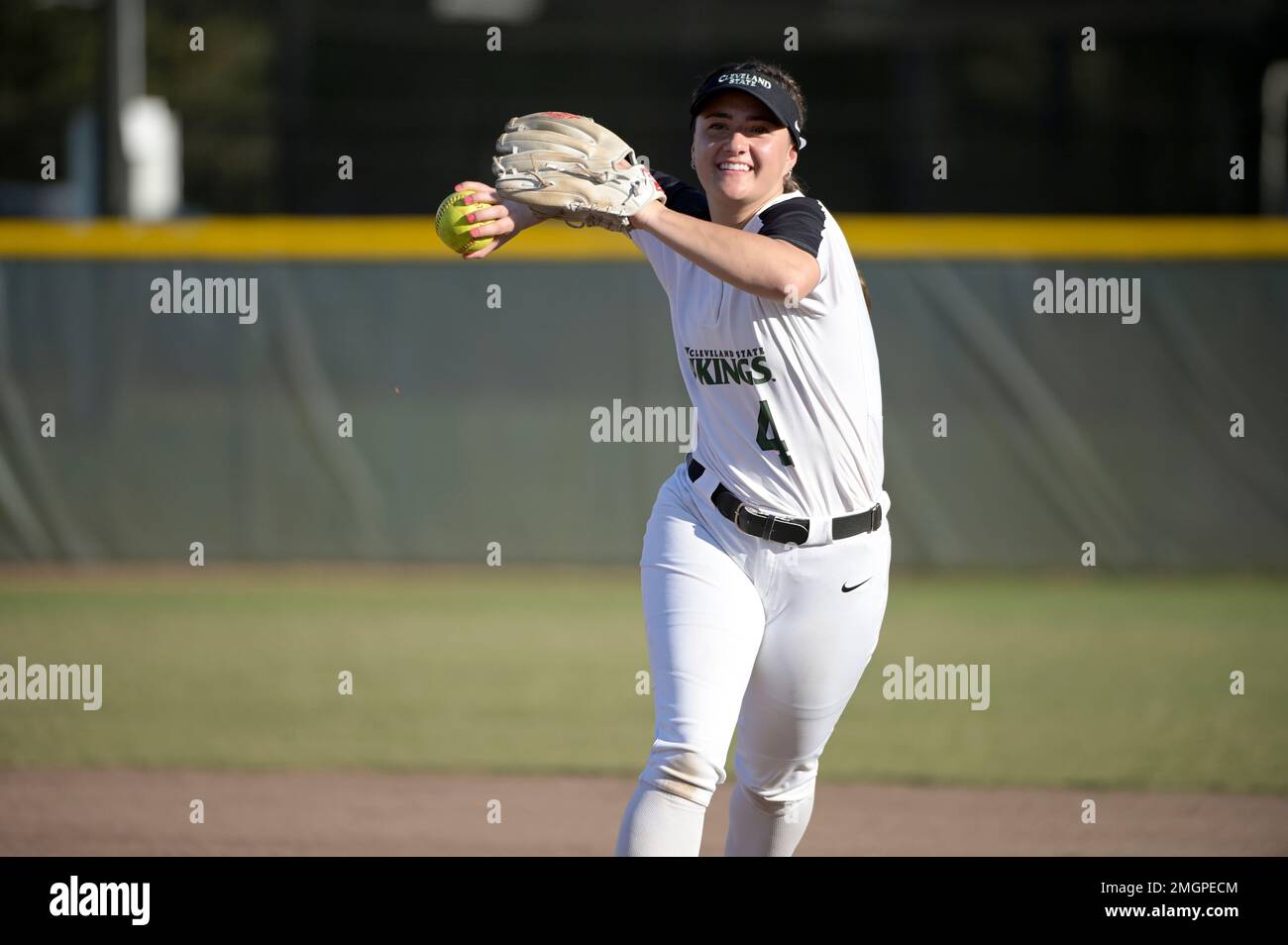Cleveland State's Hallie Ward (4) throws to first base during an NCAA ...