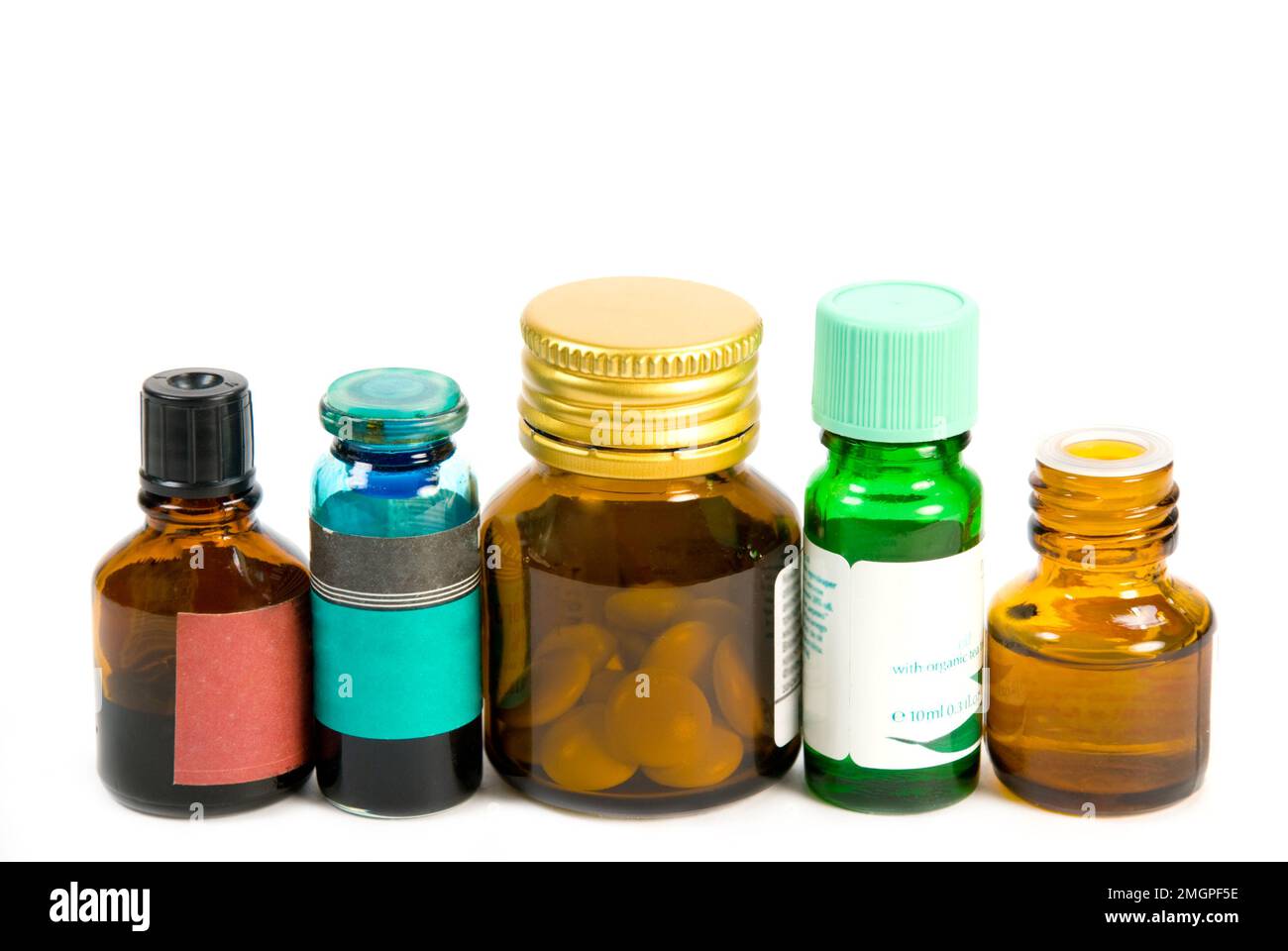 Medicine glass bottles with solutions and pills Stock Photo - Alamy