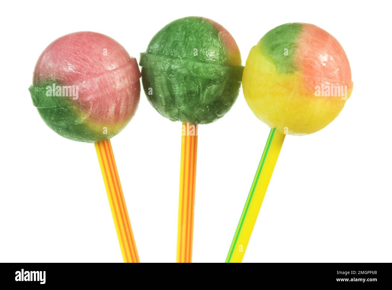Different colors lollipops on white Stock Photo - Alamy