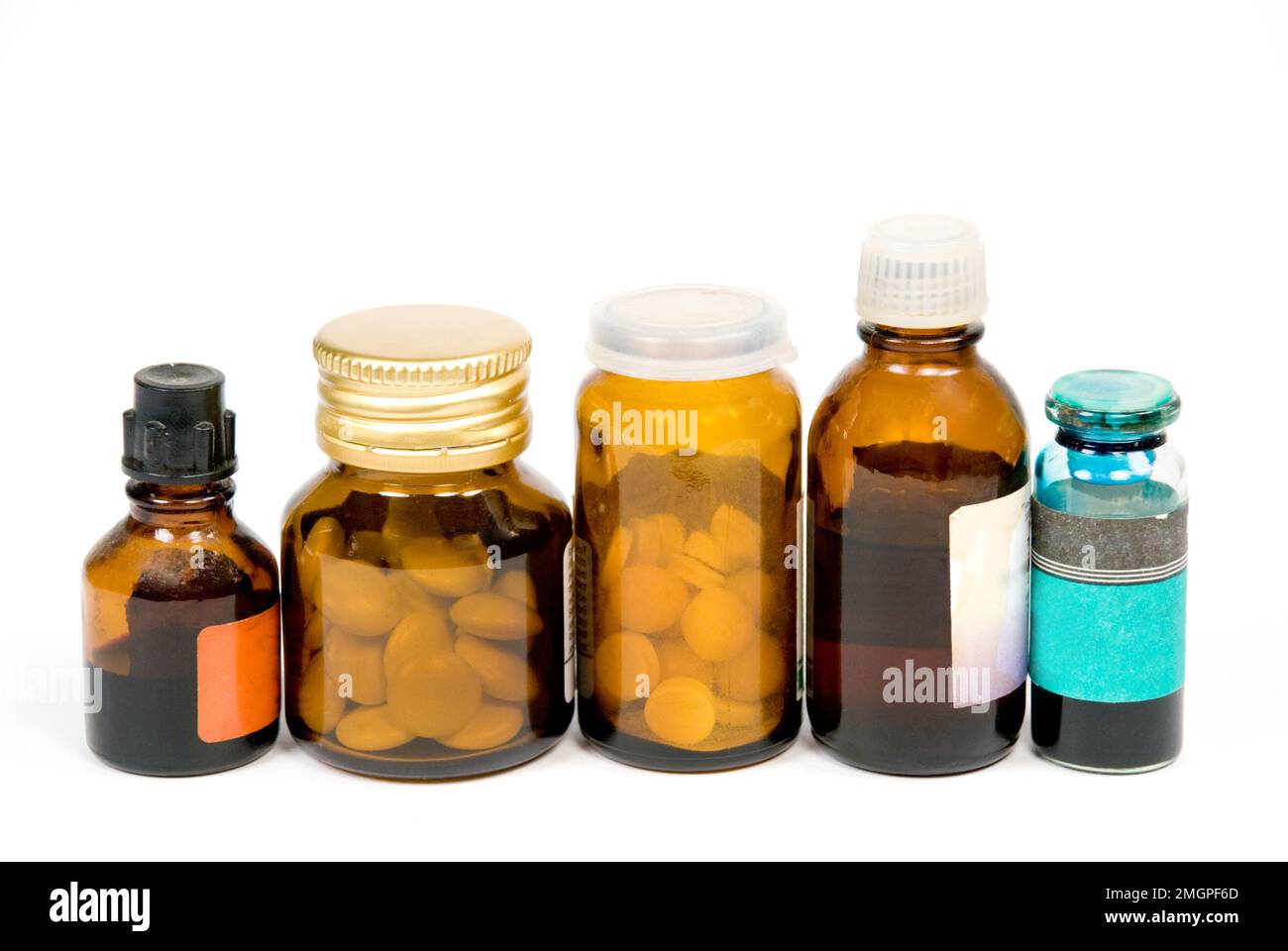 Medicine glass bottles with solutions and pills Stock Photo - Alamy