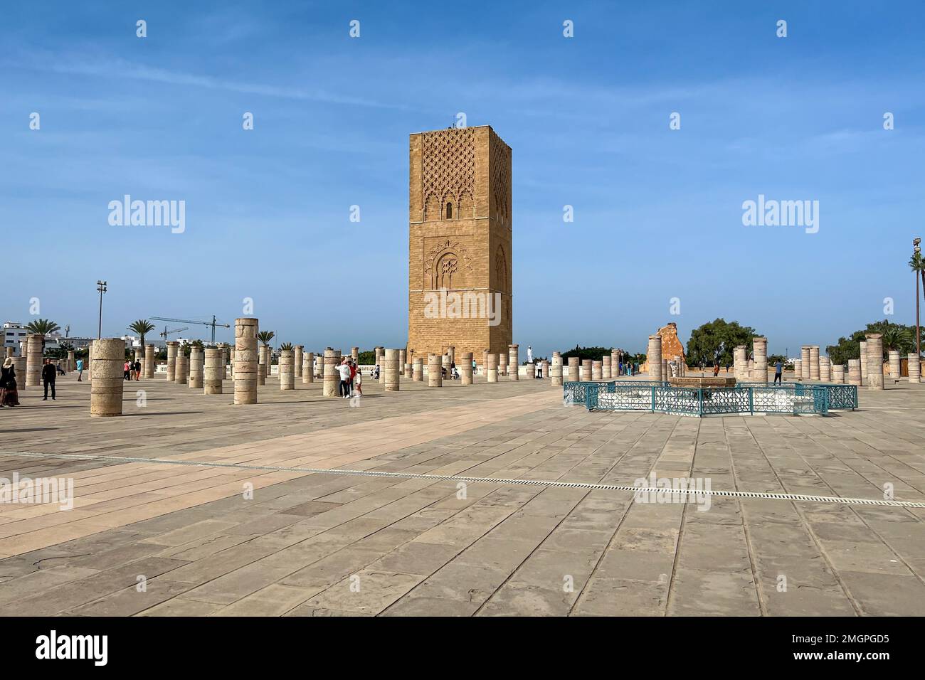 People visiting the Hassan Tower and the columns in Rabat, Morocco ...